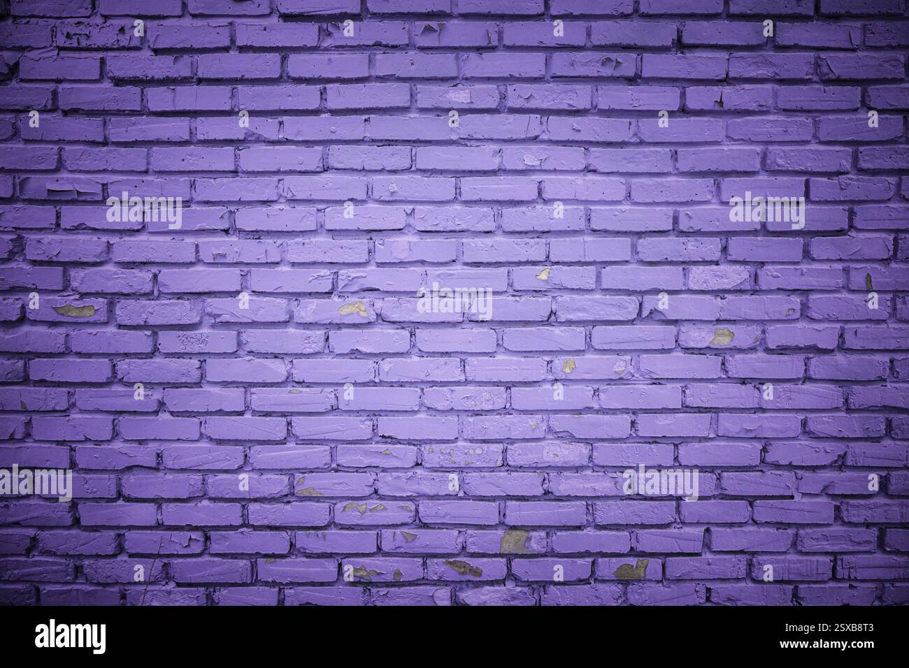 Purple brick wall with slight vignetting. Background for accent in the ...