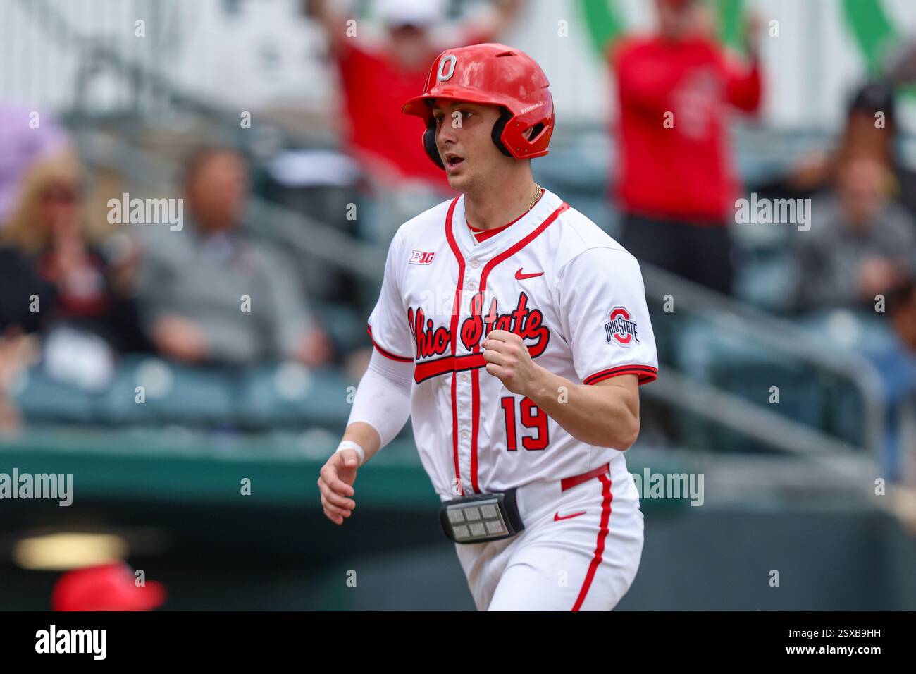 Ohio State infielder Will Carpenter (19) runs to home plate during an ...