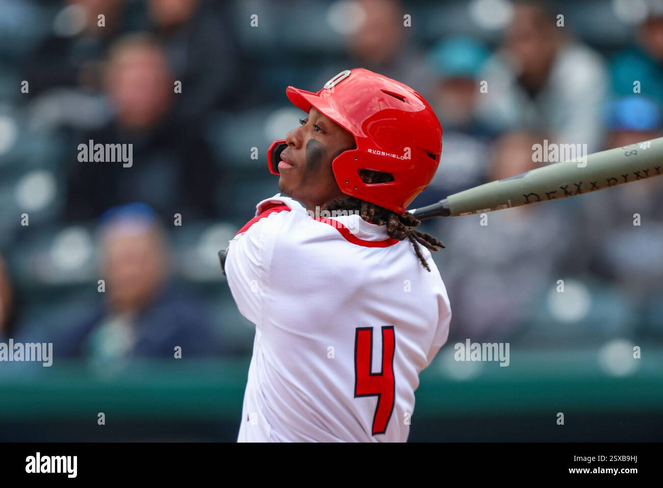 Ohio State outfielder Reggie Bussey (4) bats during an NCAA baseball ...