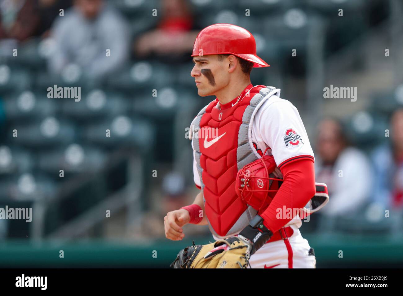 Ohio State catcher Matthew Graveline (9) looks to his pitcher during an ...