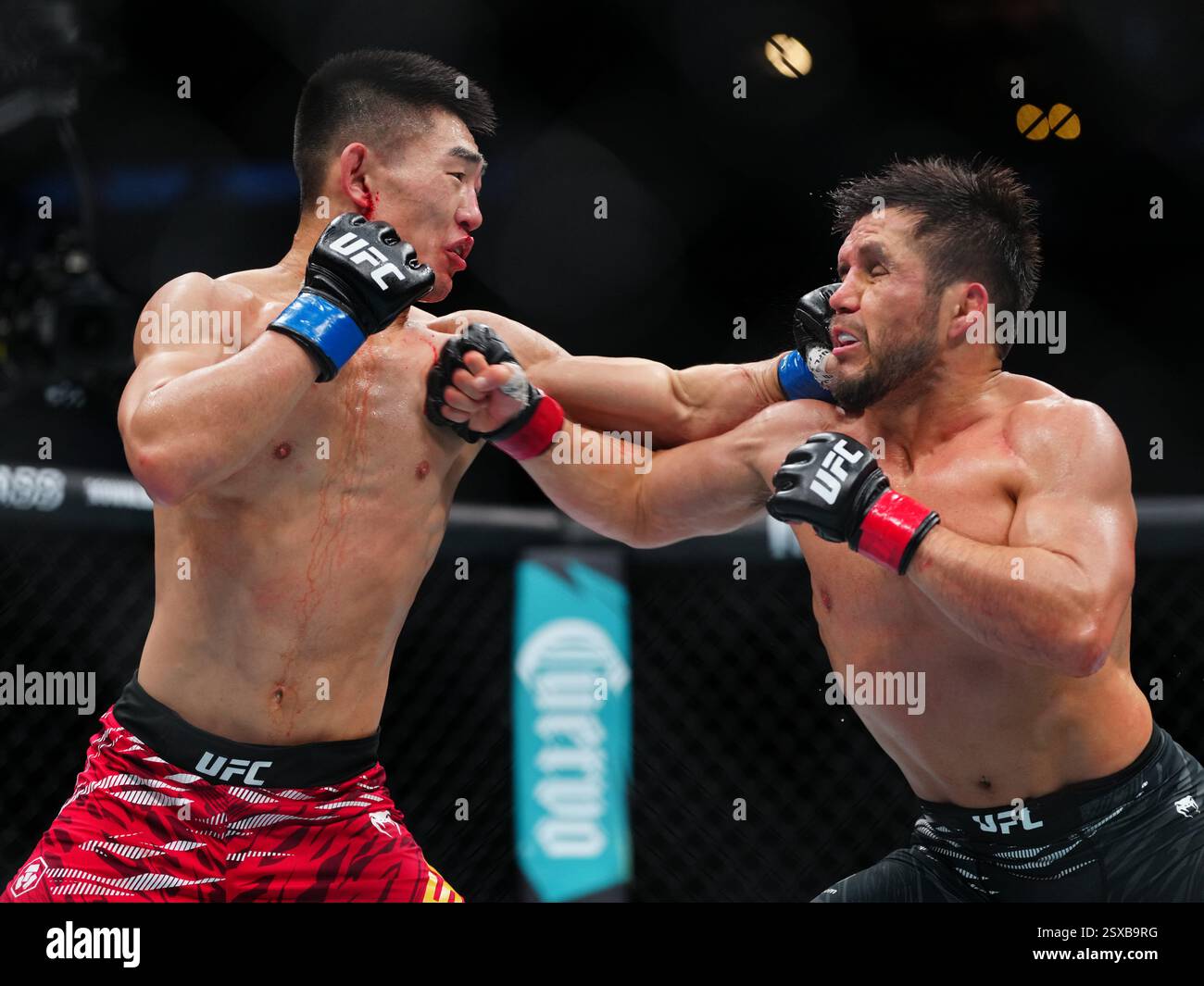SEATTLE, WA - FEBRUARY 22: Henry Cejudo and Song Yadong meet in the ...