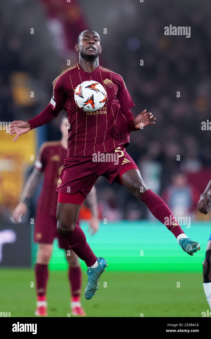 Rome, Italy. 20th Feb, 2025. Evan Ndicka of AS Roma controls the ball ...