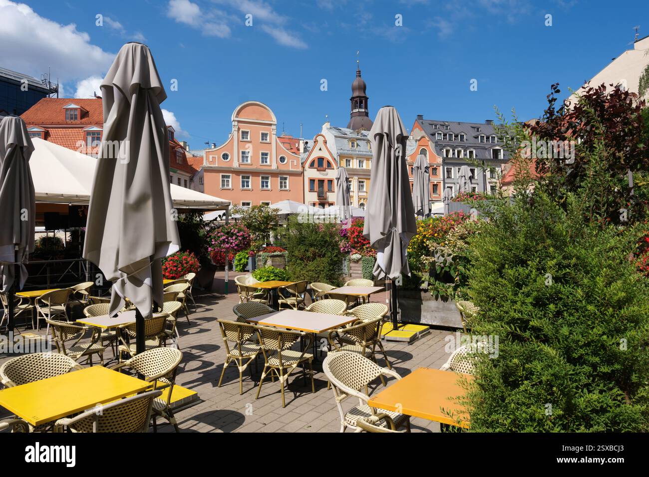 A scenic view of Tirgonu Street and medieval buildings in Riga old town ...