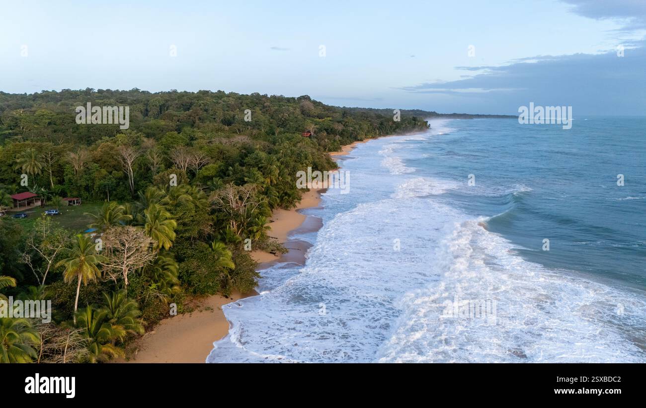 Drone Aerial view at sunrise of the beautiful Oasis Bluff Beach hotel ...