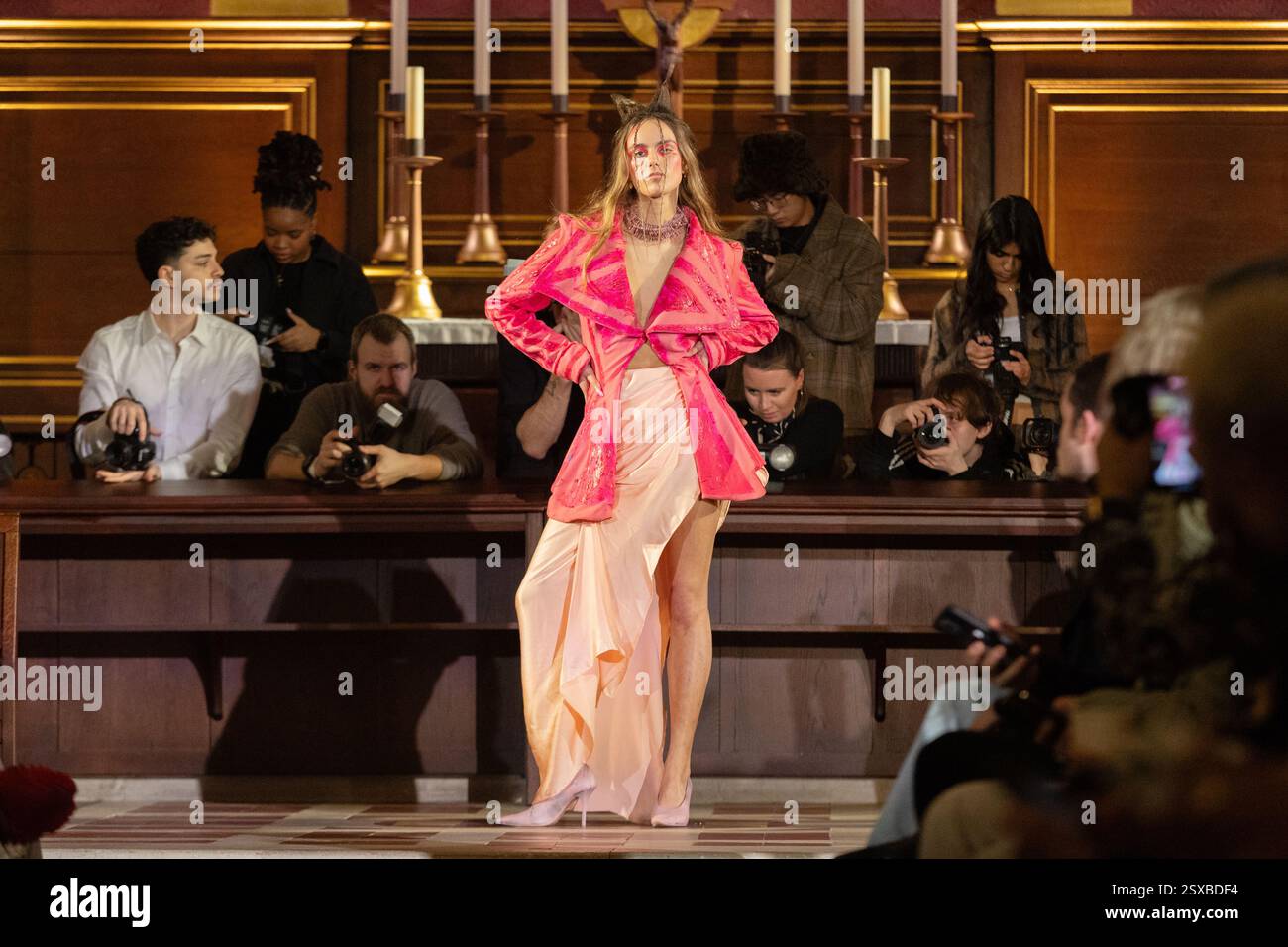 London, UK. Sunday February 23, 2025. A model on the catwalk at the ...