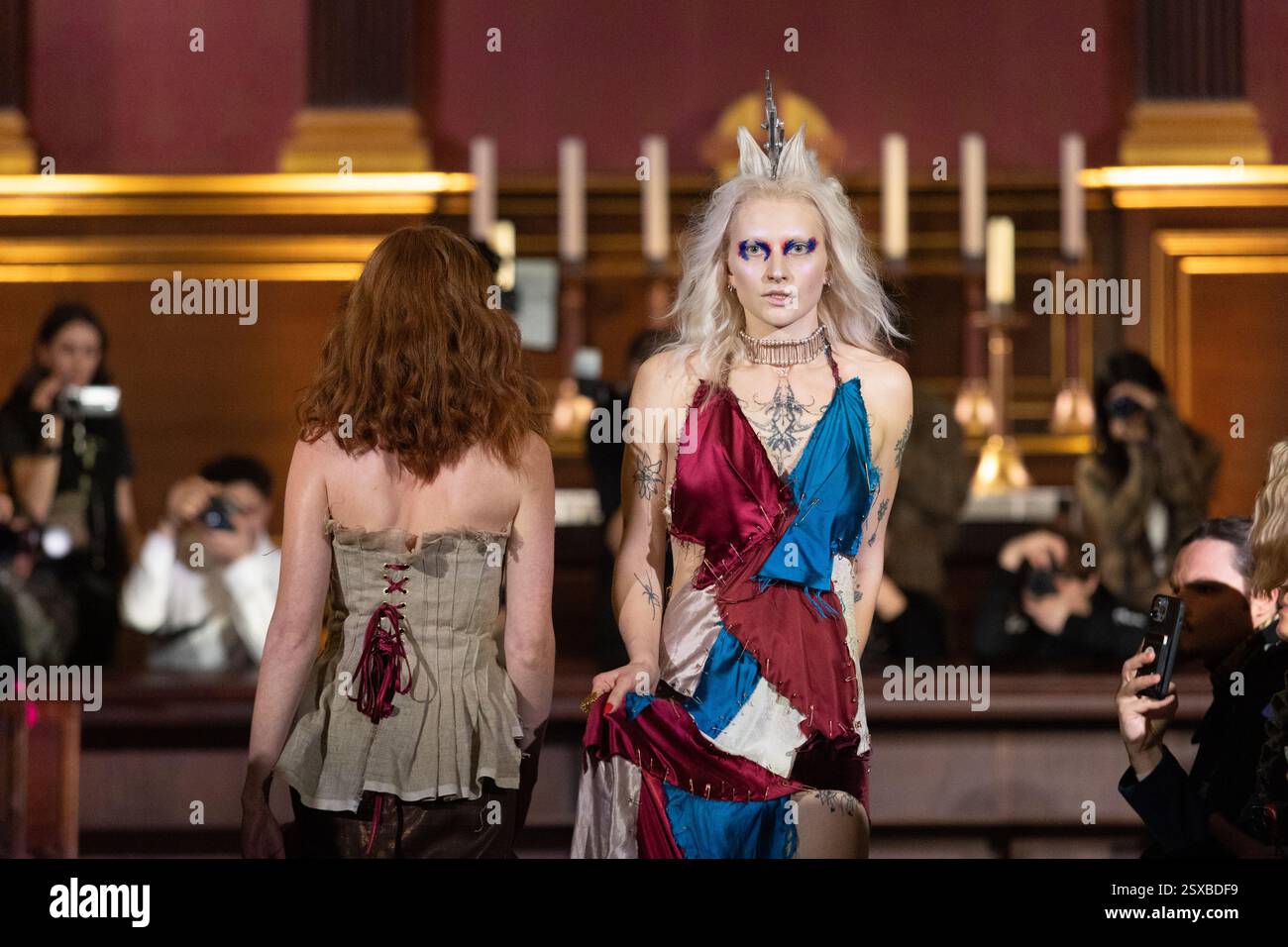 London, UK. Sunday February 23, 2025. Models on the catwalk at the ...