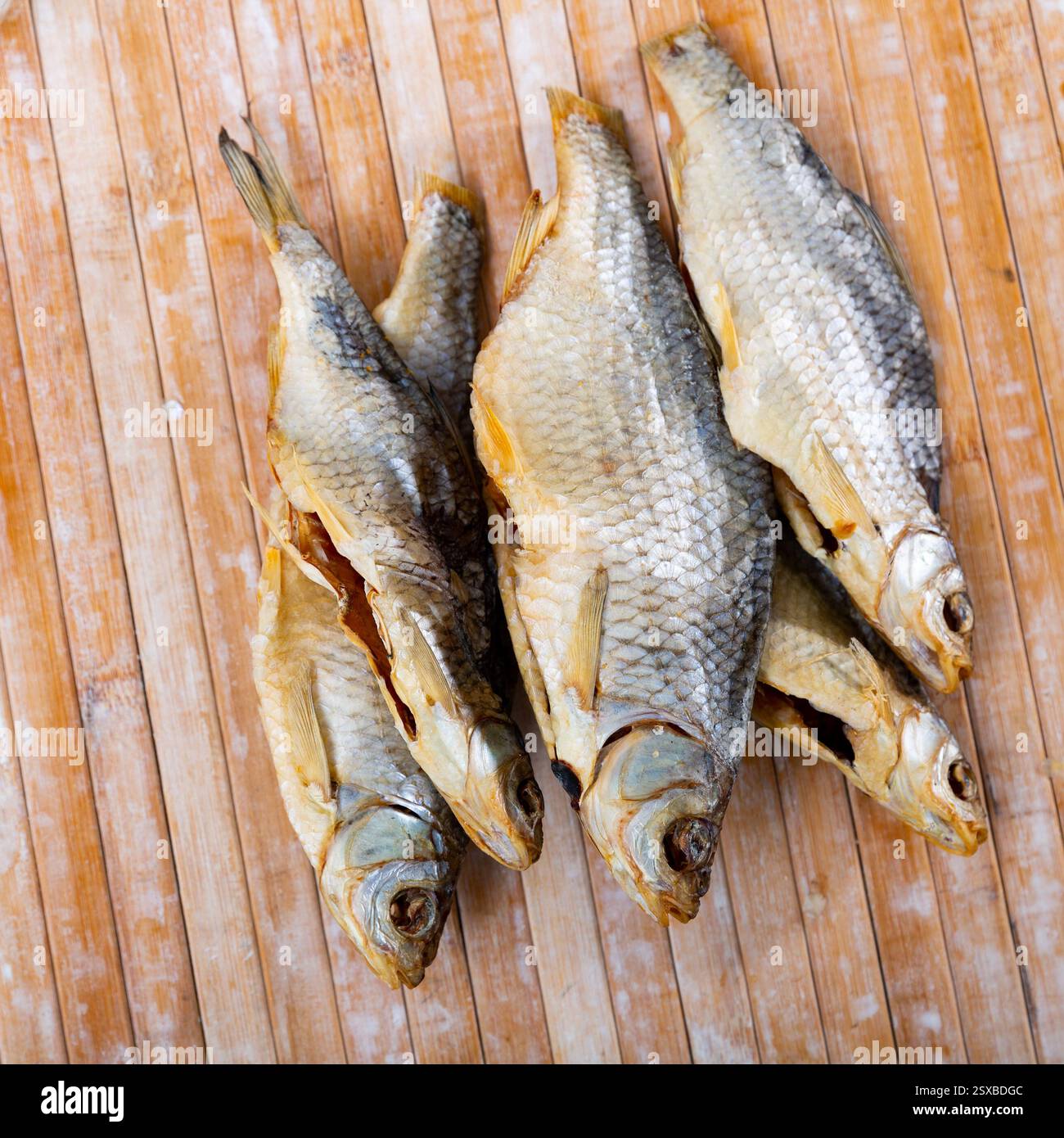 Air-dried salted gutted fish roach Stock Photo - Alamy