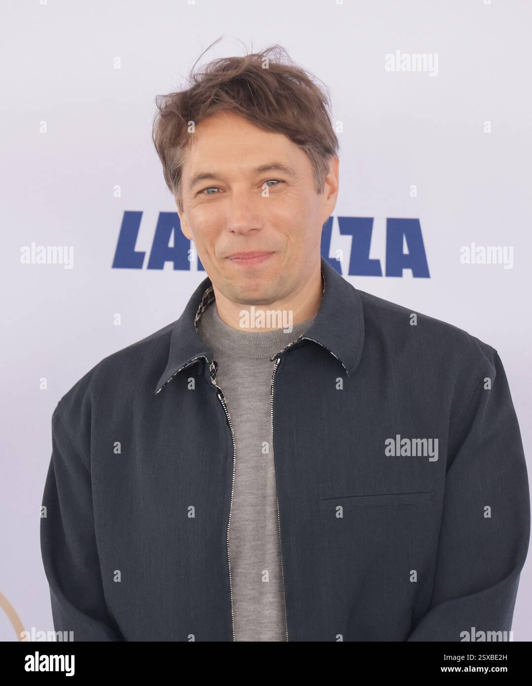 Sean Baker wearing Dior Men's arrives at the 40th Annual Film ...