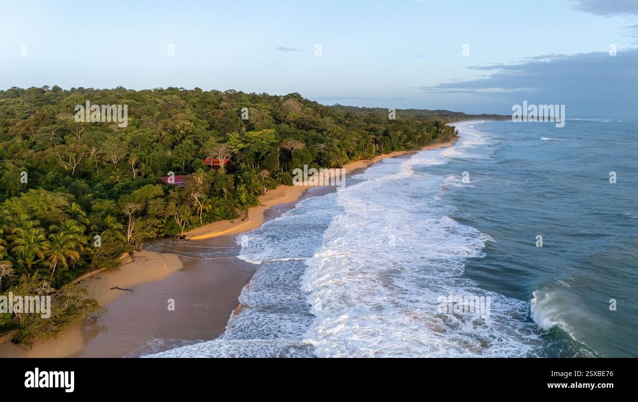 Drone Aerial view at sunrise of the beautiful Oasis Bluff Beach hotel ...