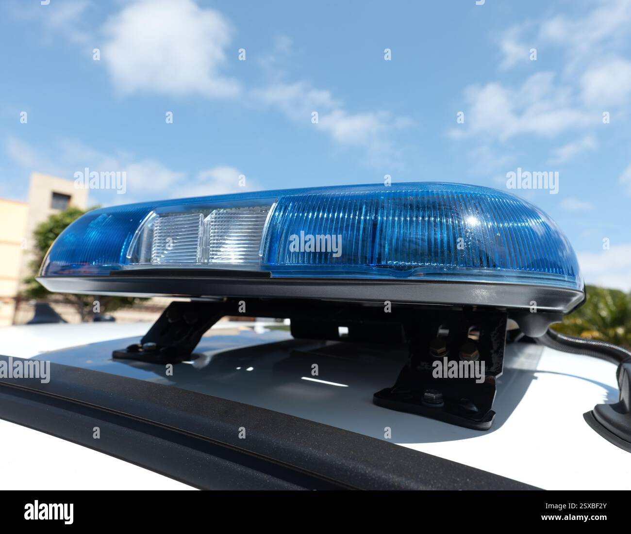 Flashing blue light of a spanish police car Stock Photo - Alamy