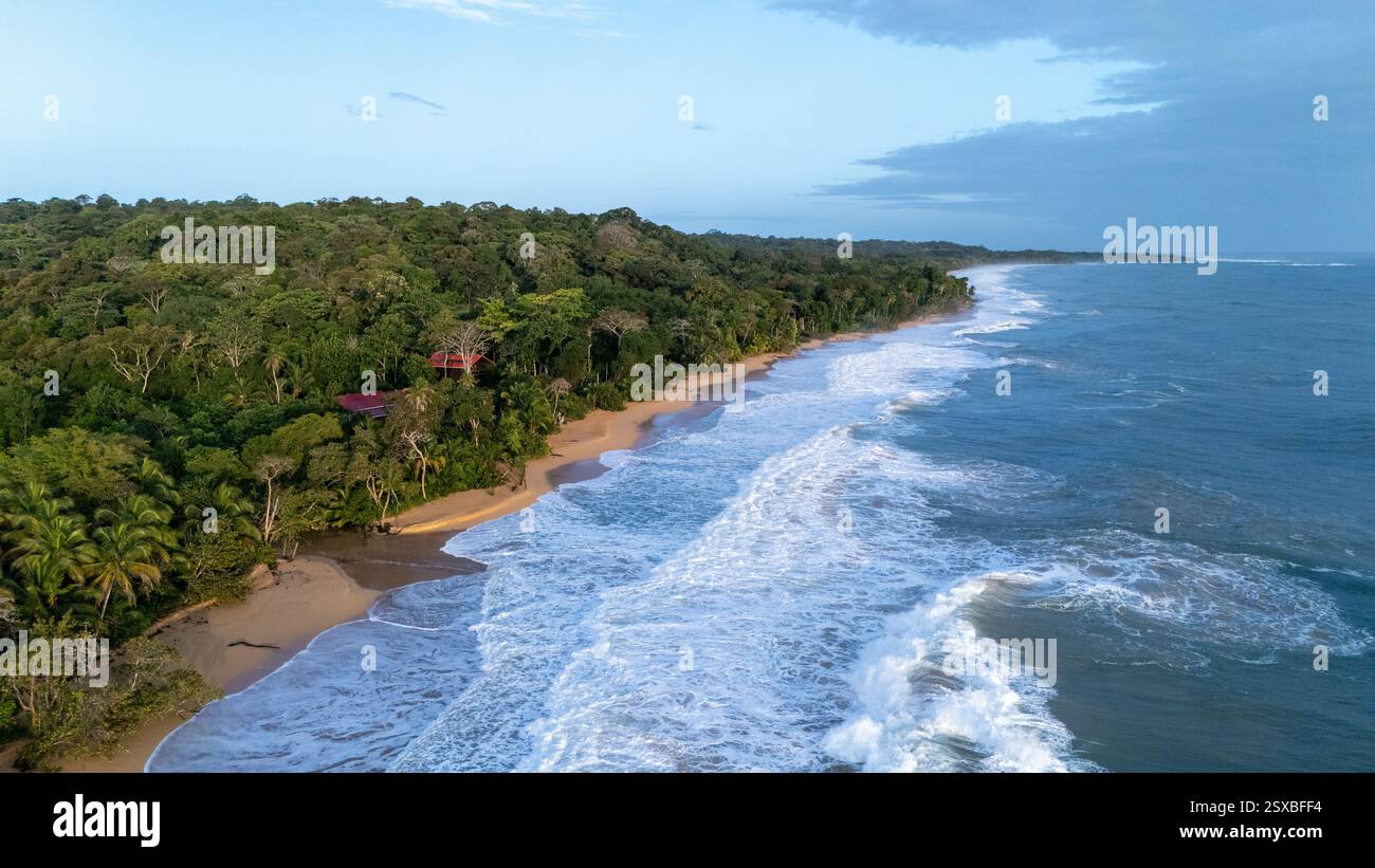 Drone Aerial view at sunrise of the beautiful Oasis Bluff Beach hotel ...