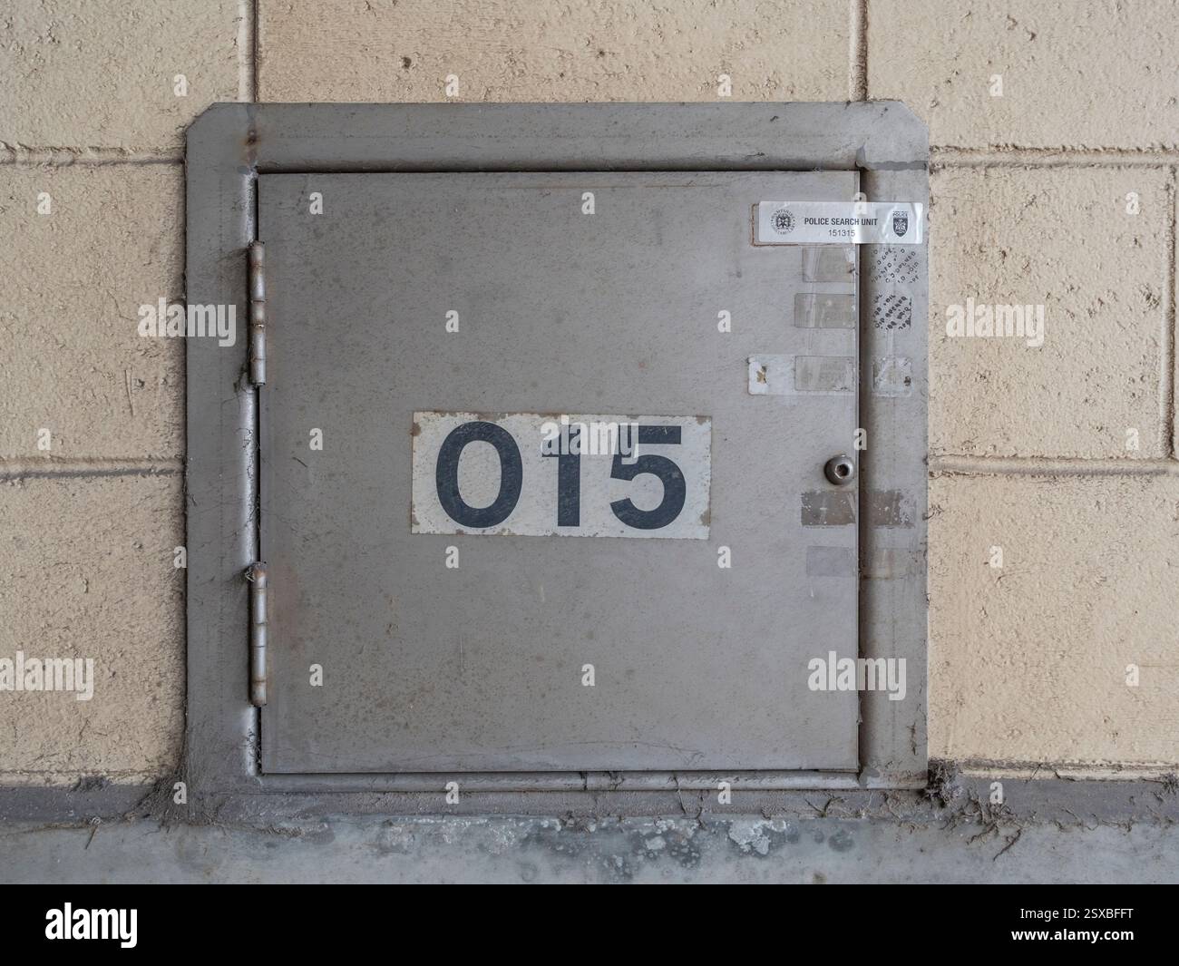 "Police Search Unit" secuirty tape on an opening on the underpass of ...