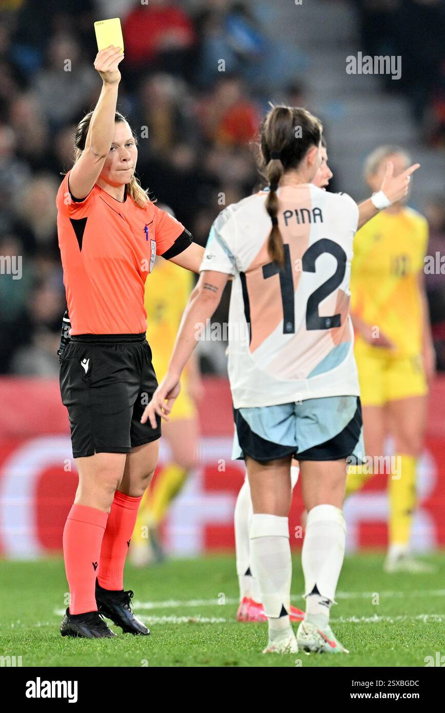 Valencia, Spain. 21st Feb, 2025. Claudia Pina (12) of Spain receives a ...