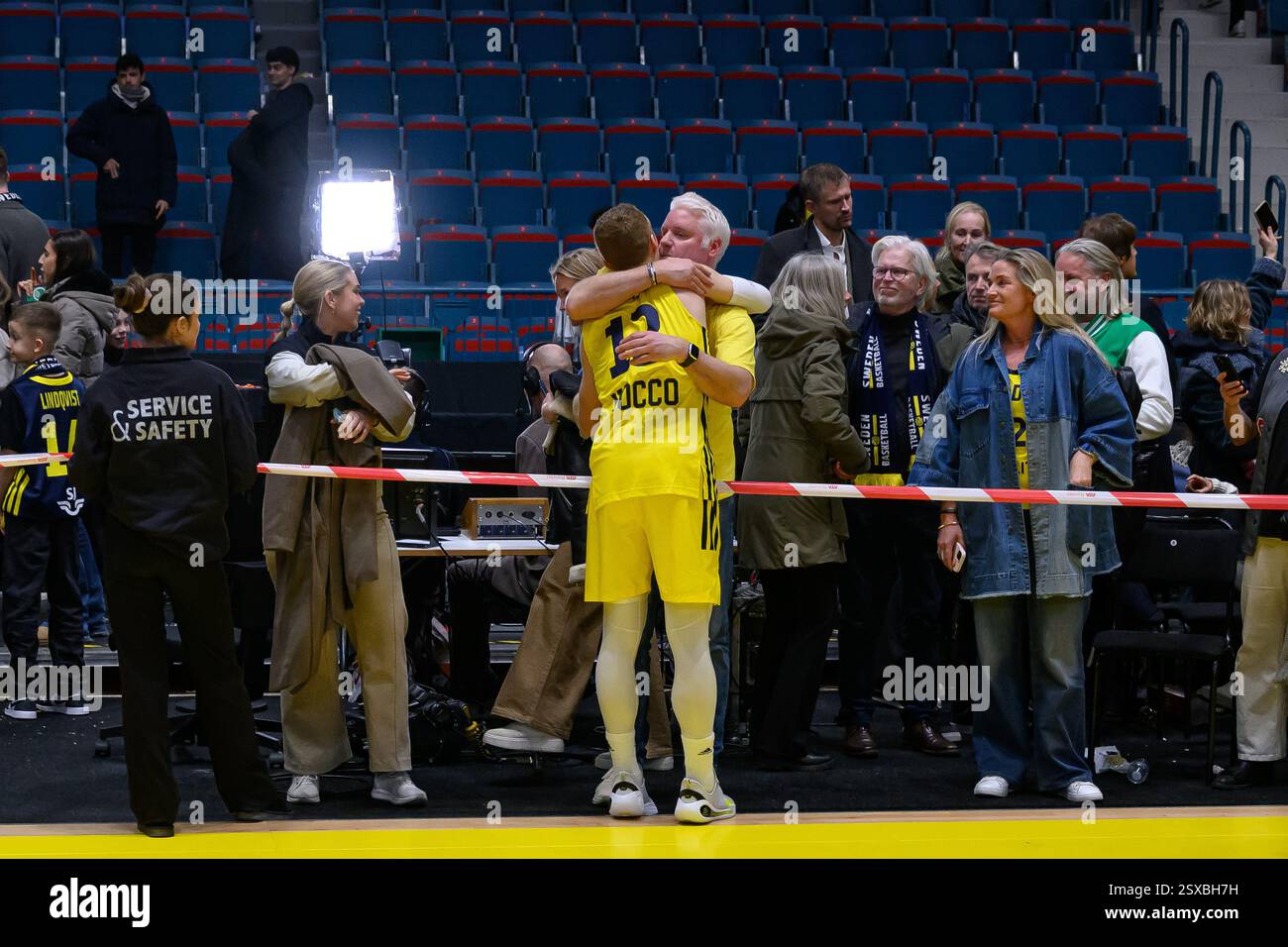 250223 Ludvig Håkanson of Sweden celebrates with father Olle Håkanson ...