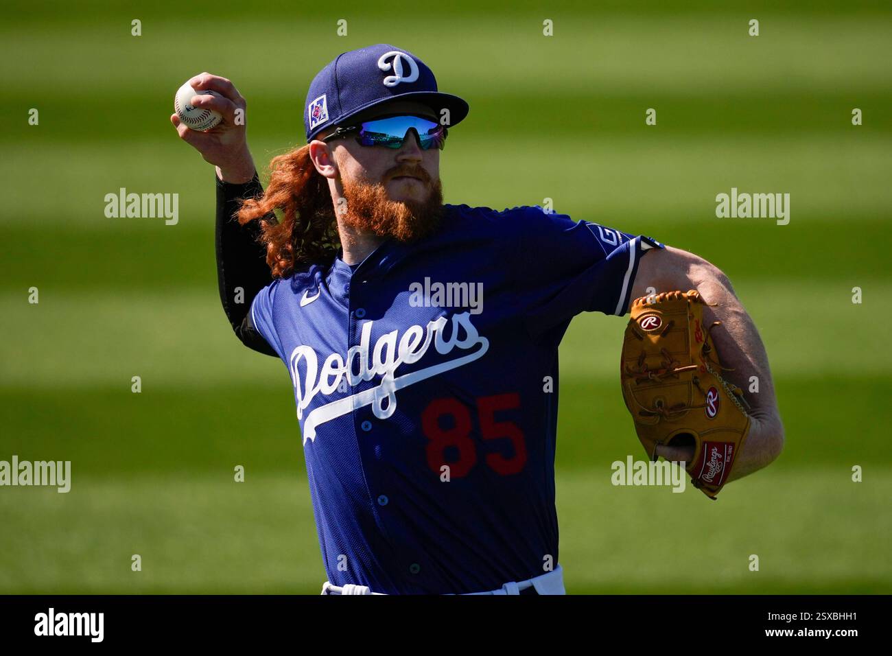 Los Angeles Dodgers starting pitcher Dustin May warms up before a ...