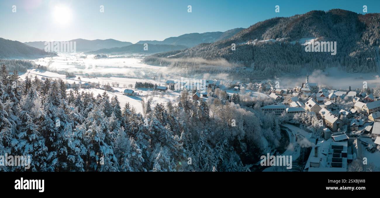 Beautiful village of Ljubno ob Savinji in cold winter morning. Visible ...