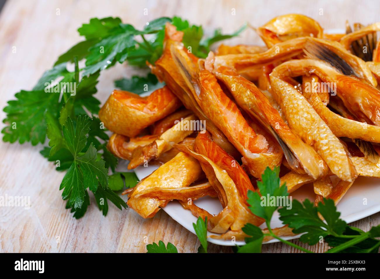 Cold smoked salmon belly strips Stock Photo - Alamy