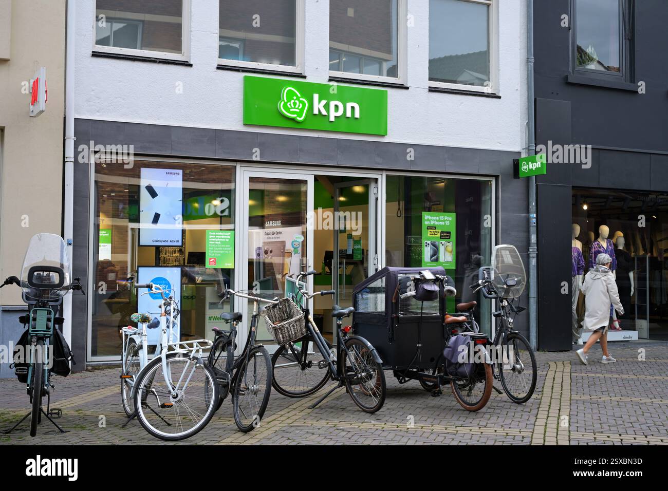 Row of bicycles in front of a KPN Store Stock Photo - Alamy