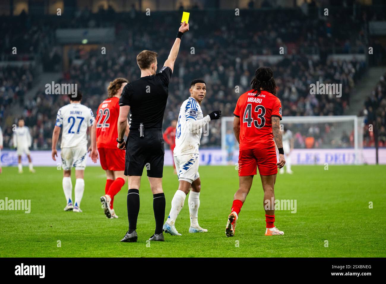 Copenhagen, Denmark. 23rd Feb, 2025. Referee Jacob Karlsen books Kevin ...