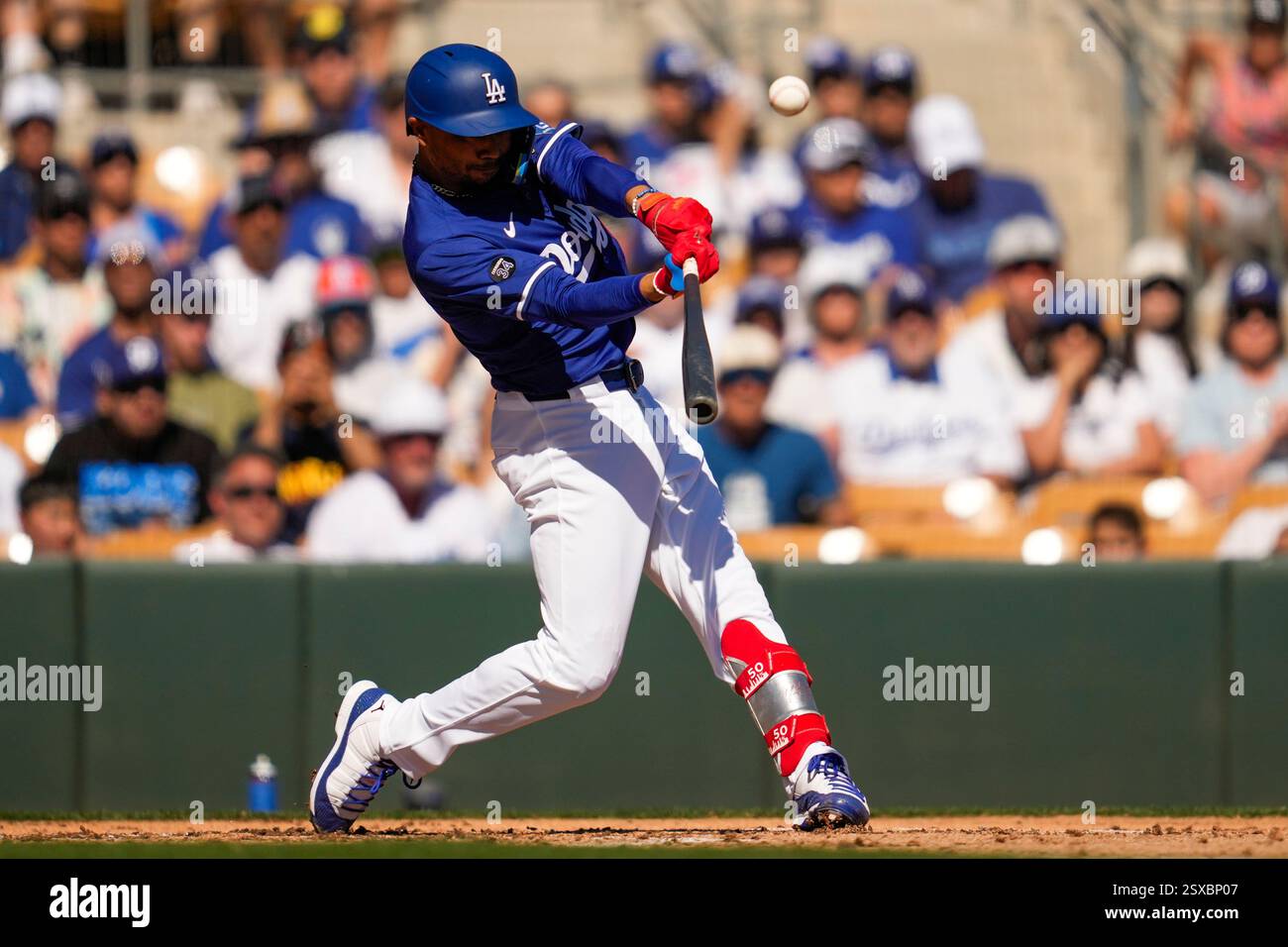 Los Angeles Dodgers' Mookie Betts hits a sacrifice fly during the ...