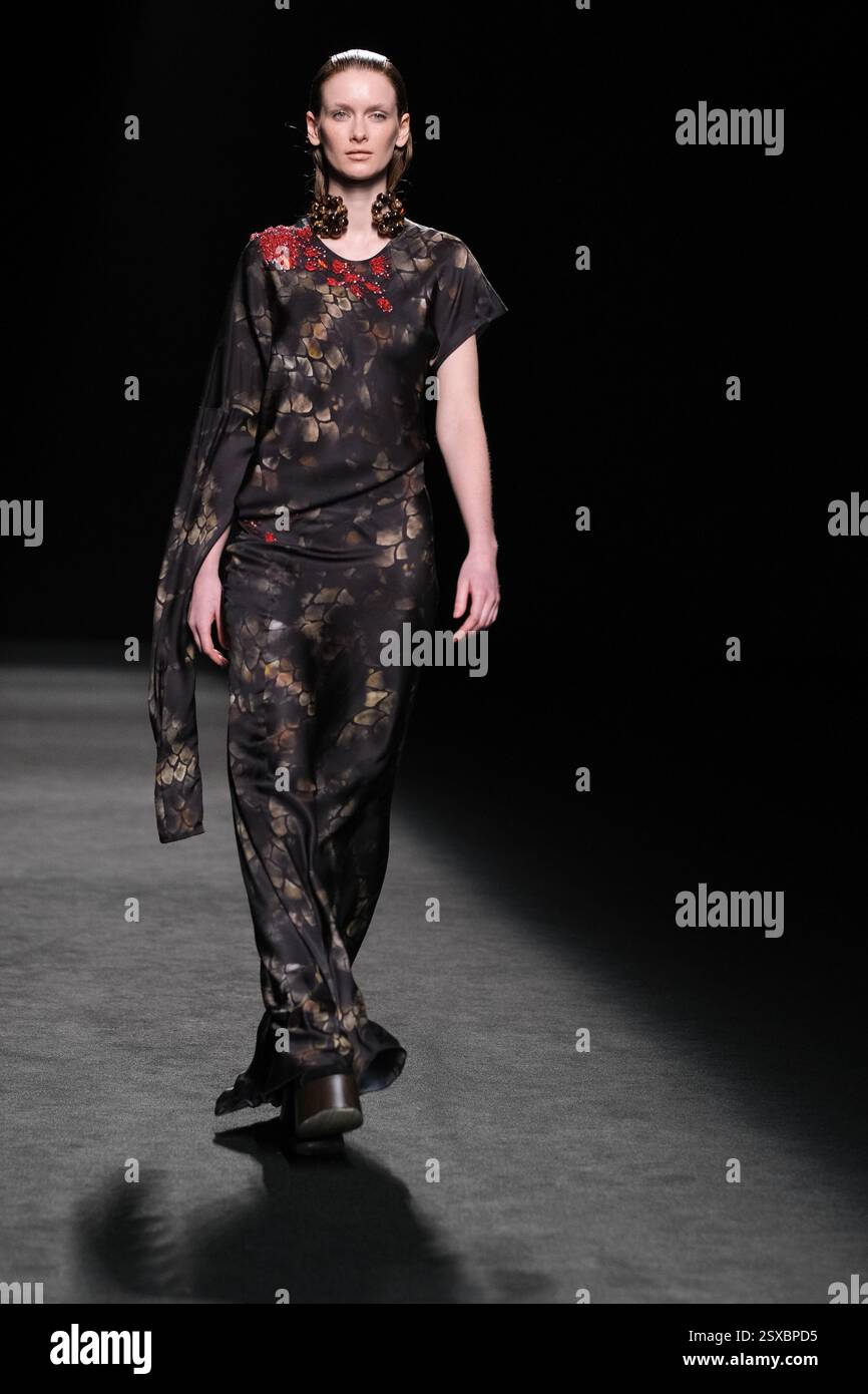 A model walks the runway a design by Sandra Weil during Mercedes-Benz ...