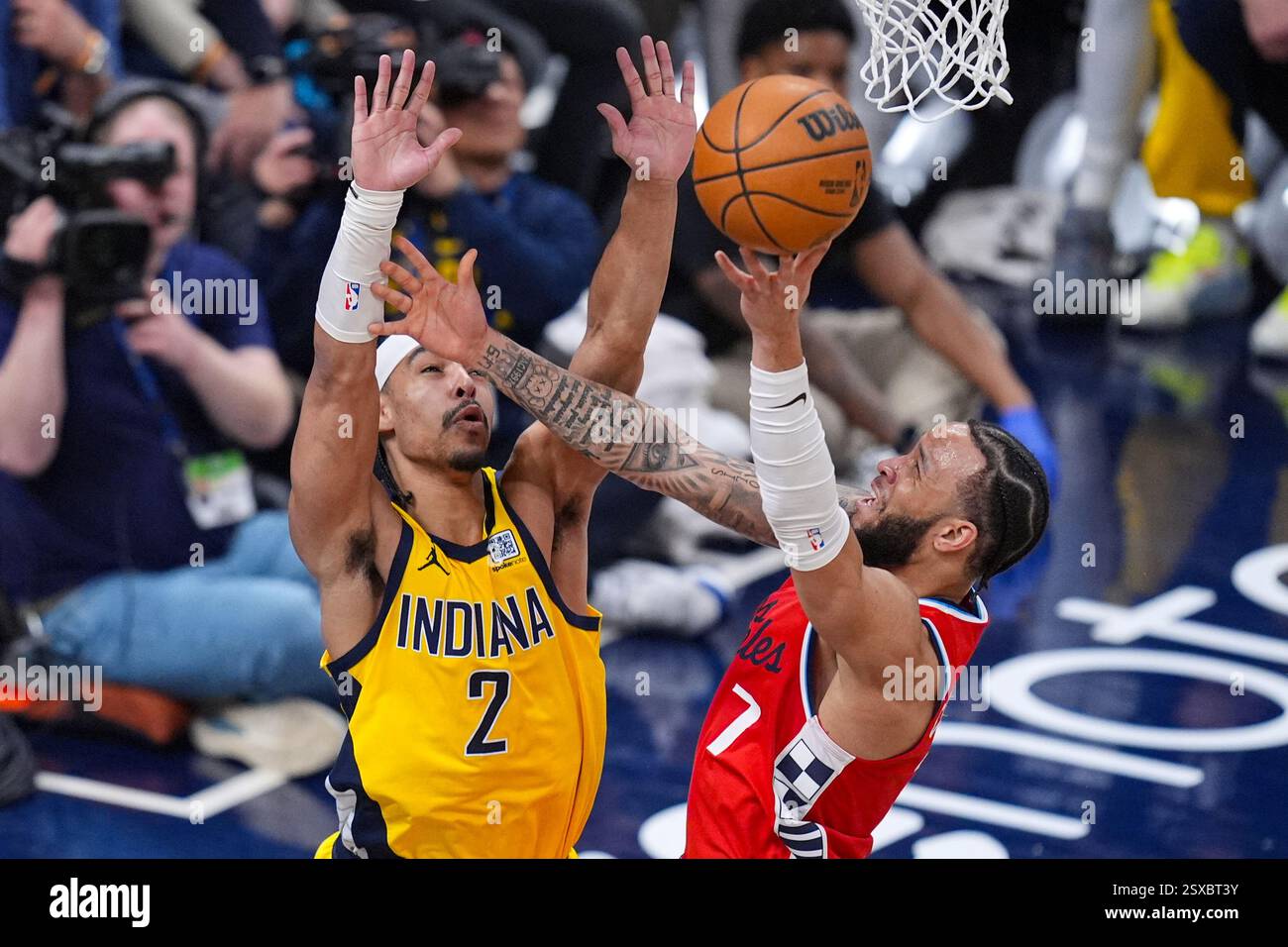 LA Clippers guard Amir Coffey (7) shoots over Indiana Pacers guard ...