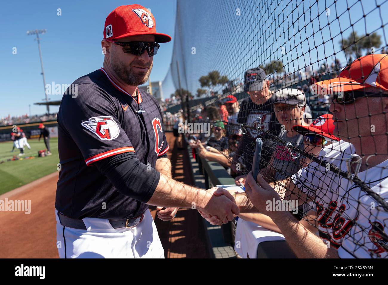 Cleveland Guardians manager Stephen Vogt greets fans before a spring ...