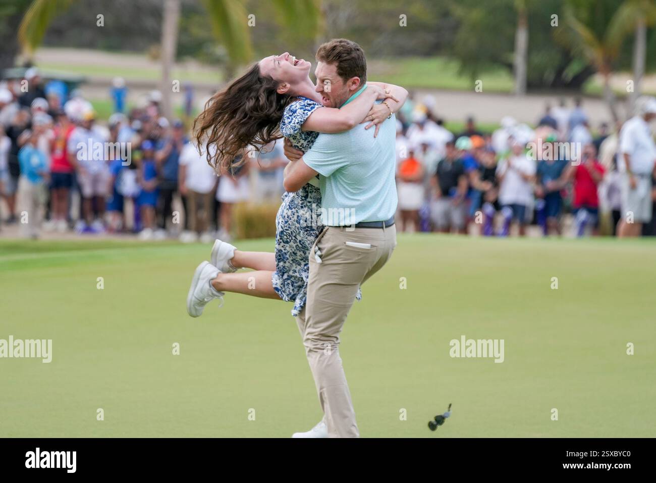 Brian Campbell, of the United States, embraces his girlfriend Kelsi ...