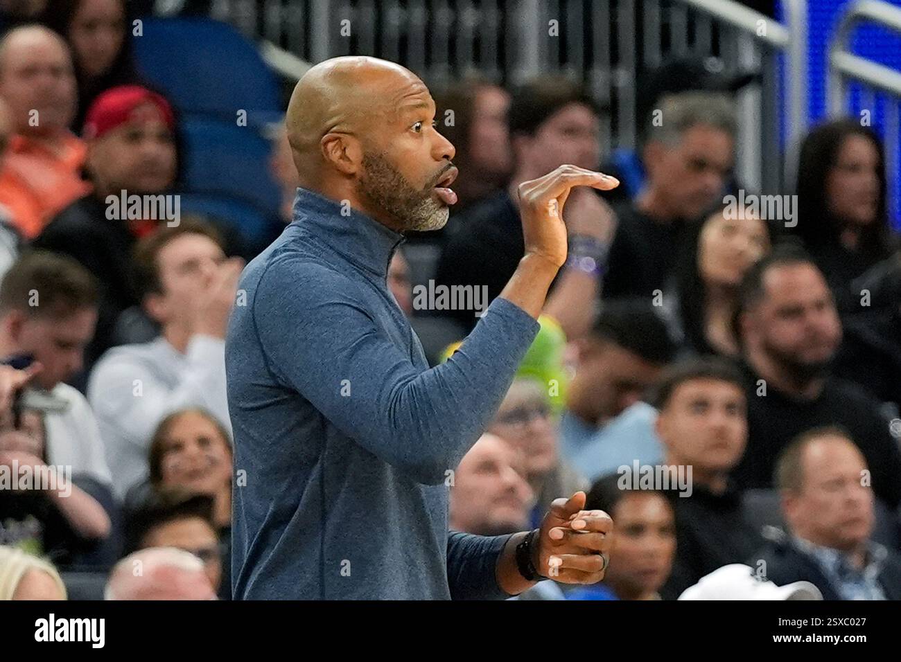 Orlando Magic head coach Jamahl Mosley directs his team on the court ...