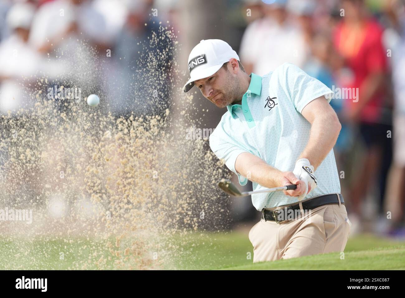 Brian Campbell, of the United States, watches his hit from a bunker on ...