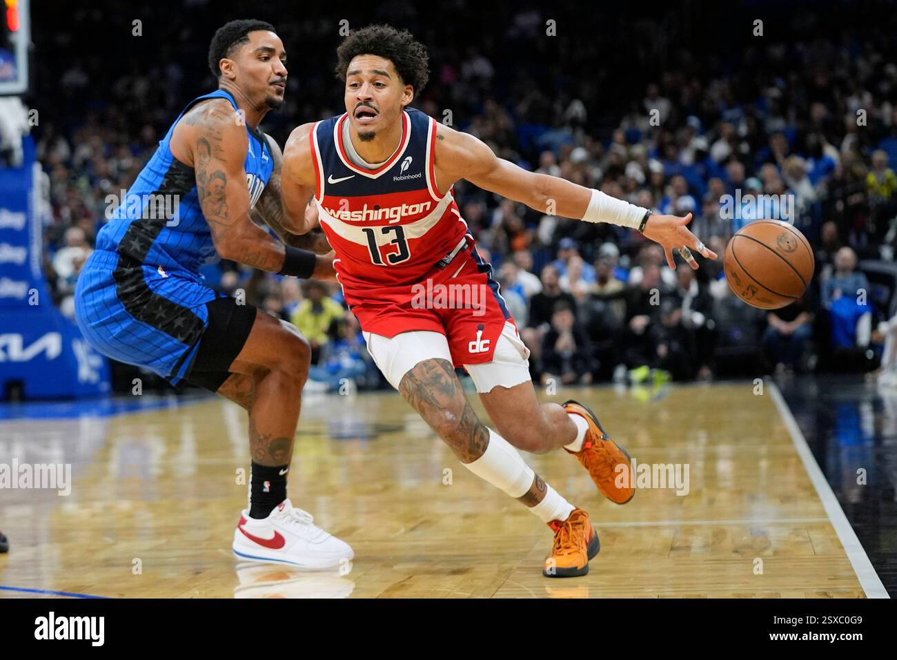 Washington Wizards guard Jordan Poole (13) loses control of the ball as ...