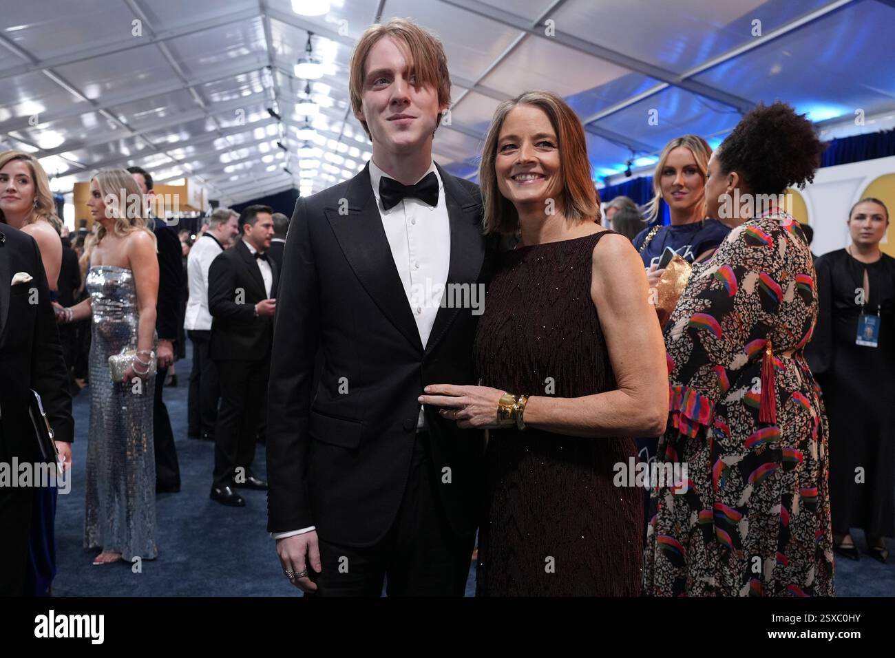 Charlie Foster, left, and Jodie Foster arrive at the 31st annual Screen ...