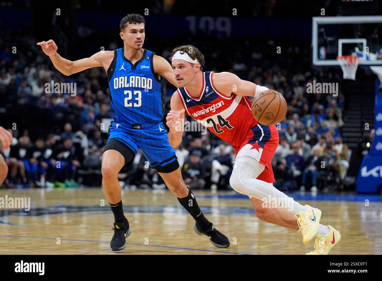 Washington Wizards forward Corey Kispert (24) drives past Orlando Magic ...
