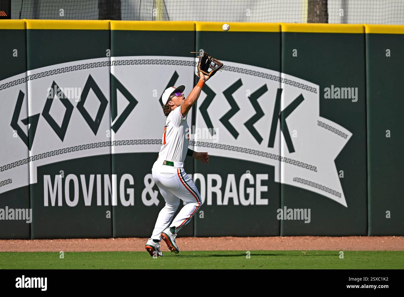 CORAL GABLES, FL - FEBRUARY 23: Miami outfielder Max Galvin (7) catches ...