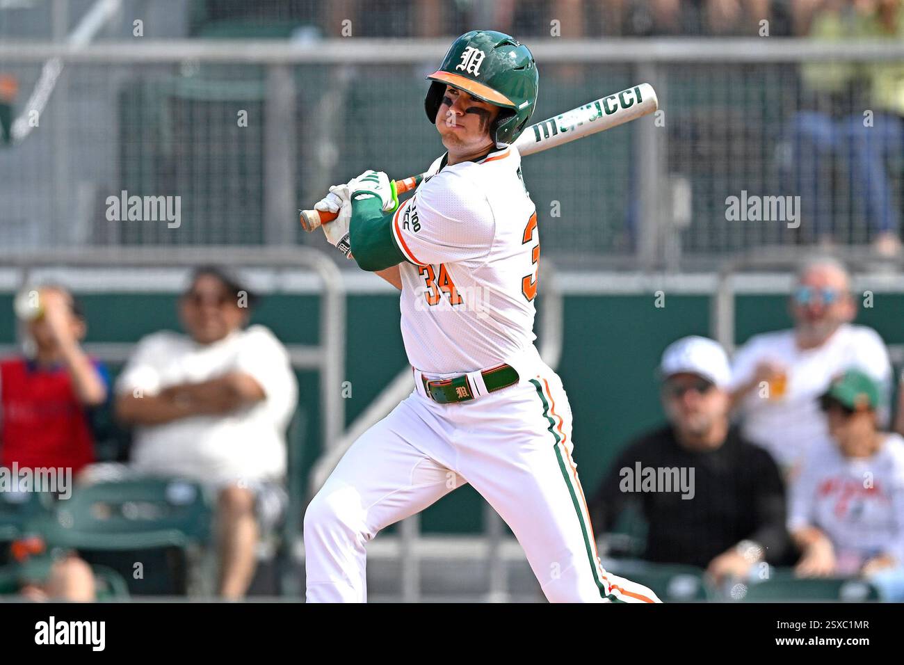 CORAL GABLES, FL - FEBRUARY 23: Miami outfielder Michael Torres (34 ...