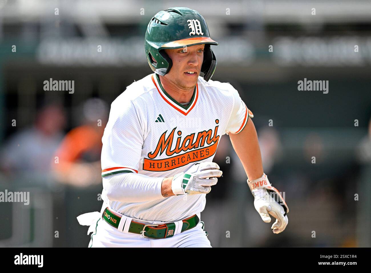 CORAL GABLES, FL - FEBRUARY 23: Miami catcher Tanner Smith (30) runs to ...
