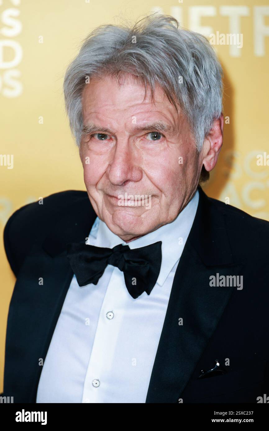 Harrison Ford walking on the red carpet at the 31st Annual Screen ...