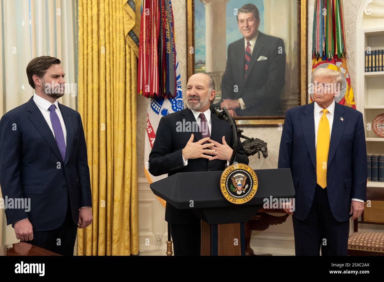 President Donald Trump makes remarks at the swearing-in of Commerce ...