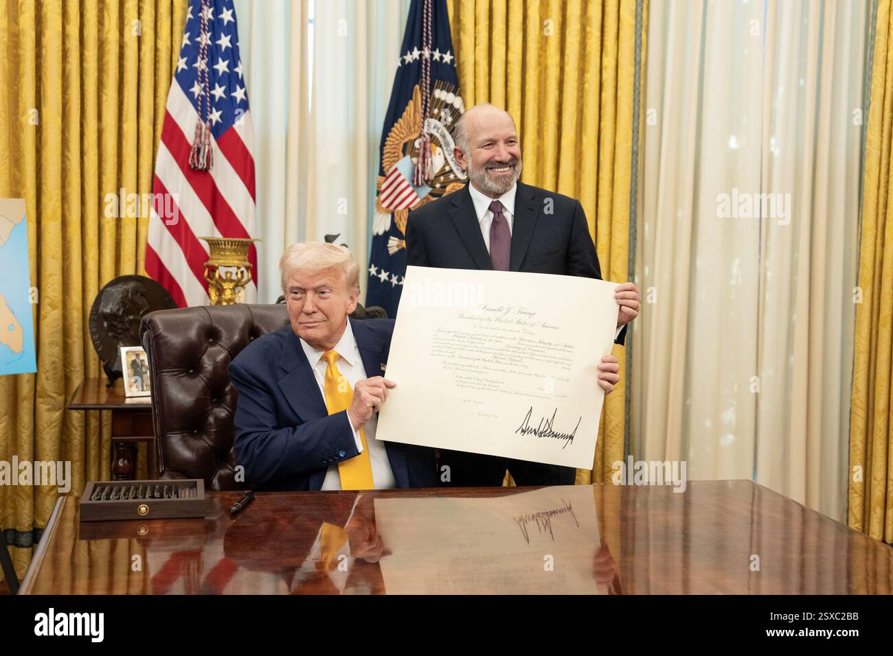 President Donald Trump makes remarks at the swearing-in of Commerce ...