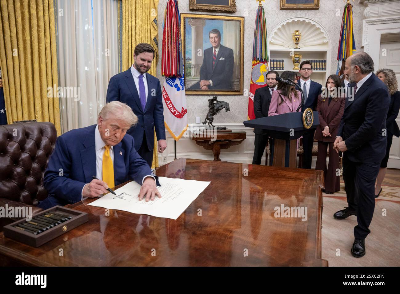 President Donald Trump makes remarks at the swearing-in of Commerce ...