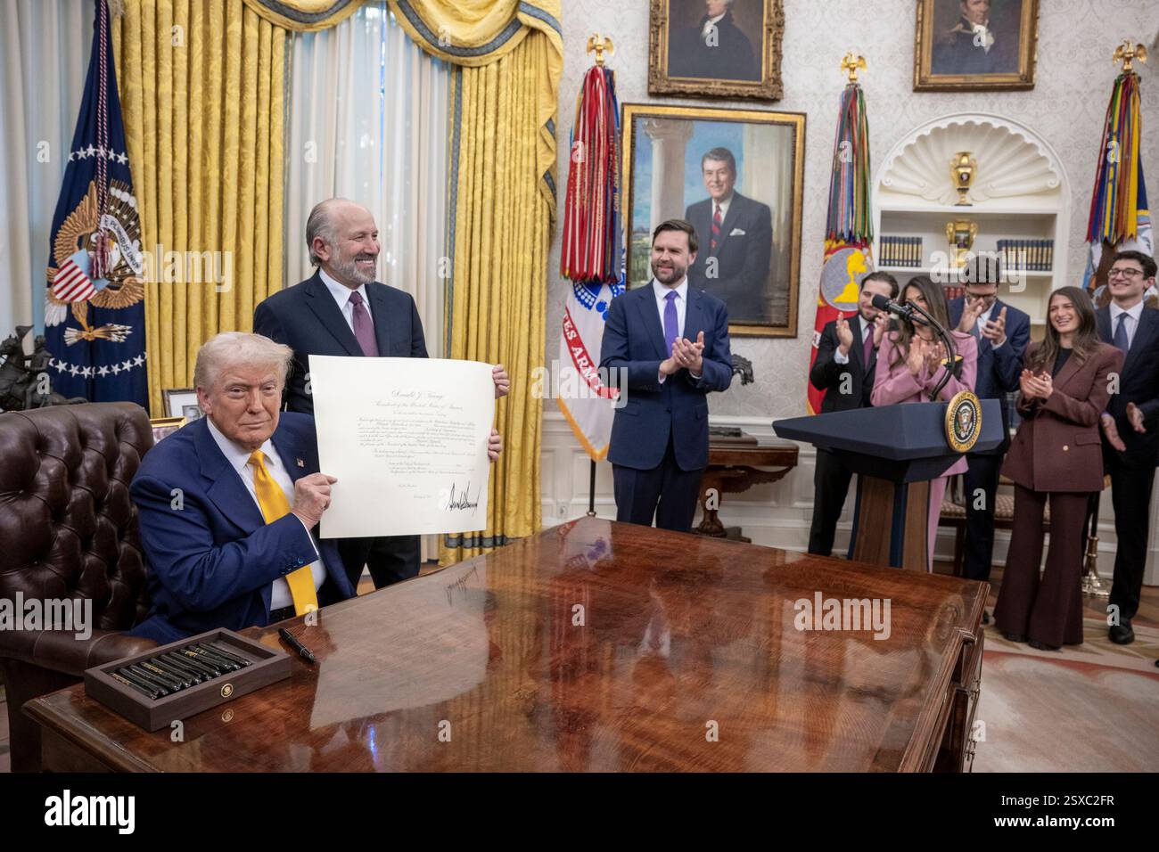 President Donald Trump makes remarks at the swearing-in of Commerce ...