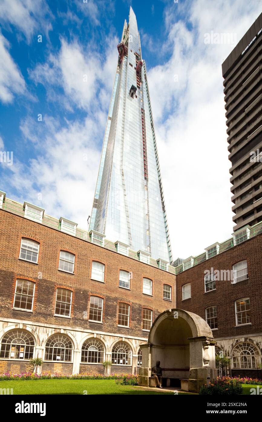 The Shard, London's tallest building, dominates the skyline above ...