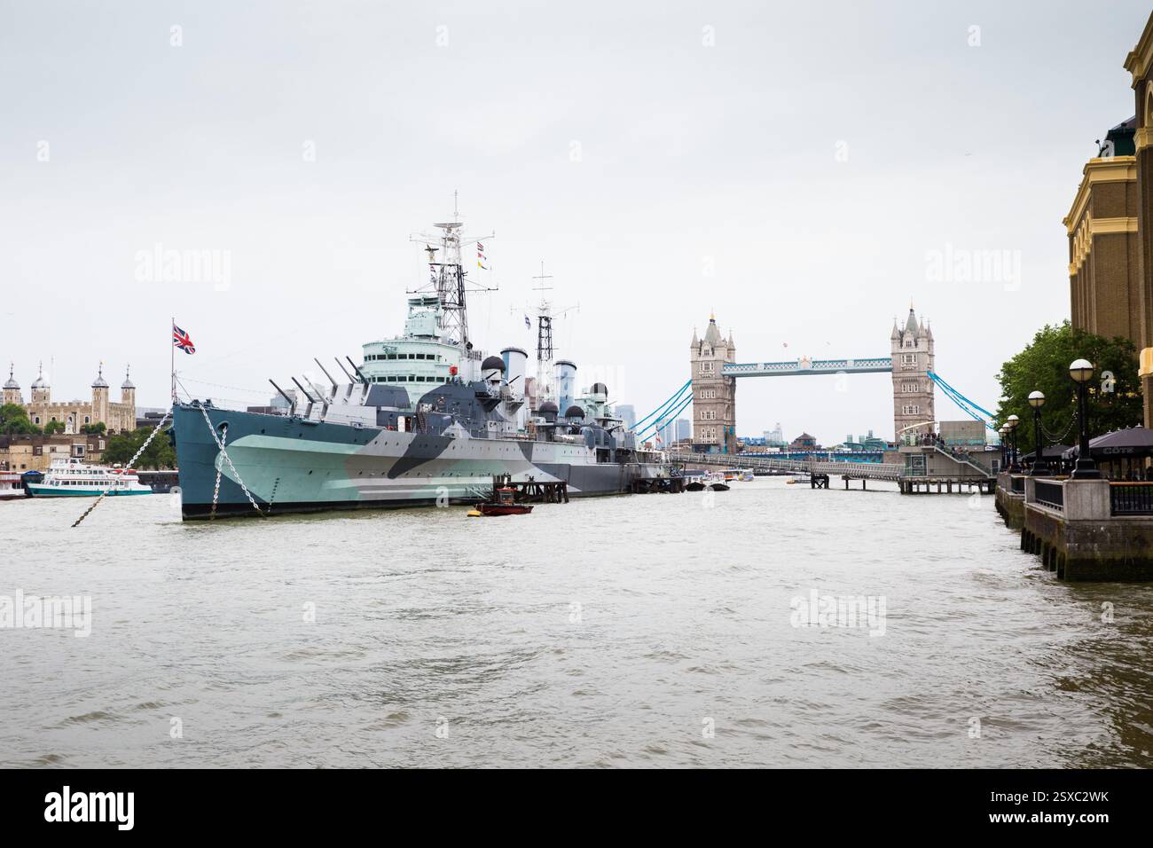 HMS Belfast, a historic warship, moored on the River Thames near Tower ...