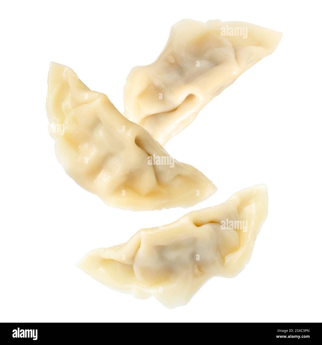 Tasty boiled gyoza (dumplings) in air on white background Stock Photo ...