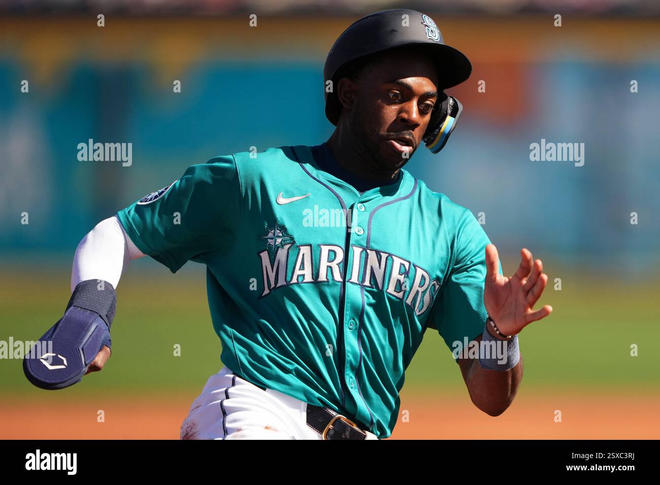 Seattle Mariners' Ryan Bliss runs home on a single by Ben Williamson ...