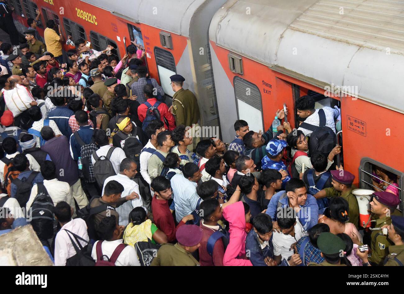 Patna, India. 23rd Feb, 2025. PATNA, INDIA - FEBRUARY 23: Passengers ...