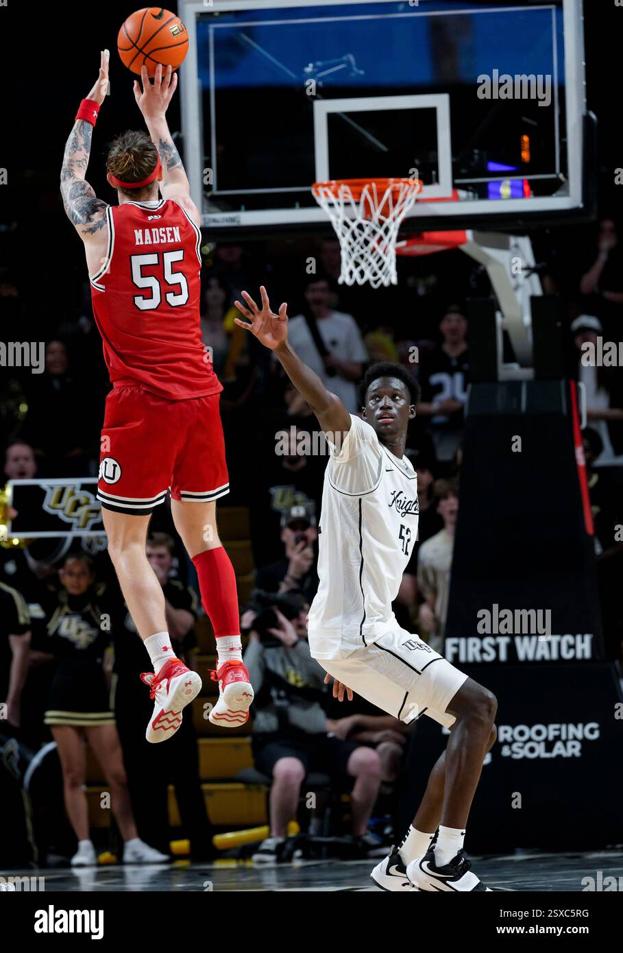 ORLANDO, FL - FEBRUARY 23: Utah Utes guard Gabe Madsen (55) ties the ...