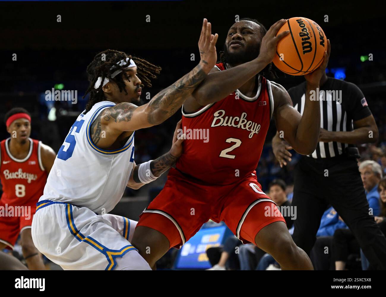 LOS ANGELES, CA - FEBRUARY 23: UCLA Bruins guard Skyy Clark (55) tries ...