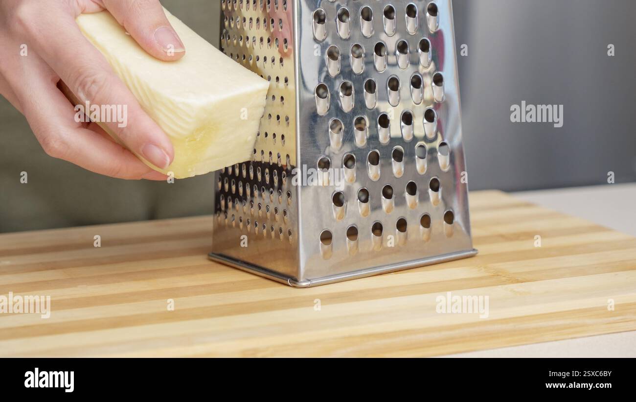 Chef grating traditional parmesan hi-res stock photography and images ...