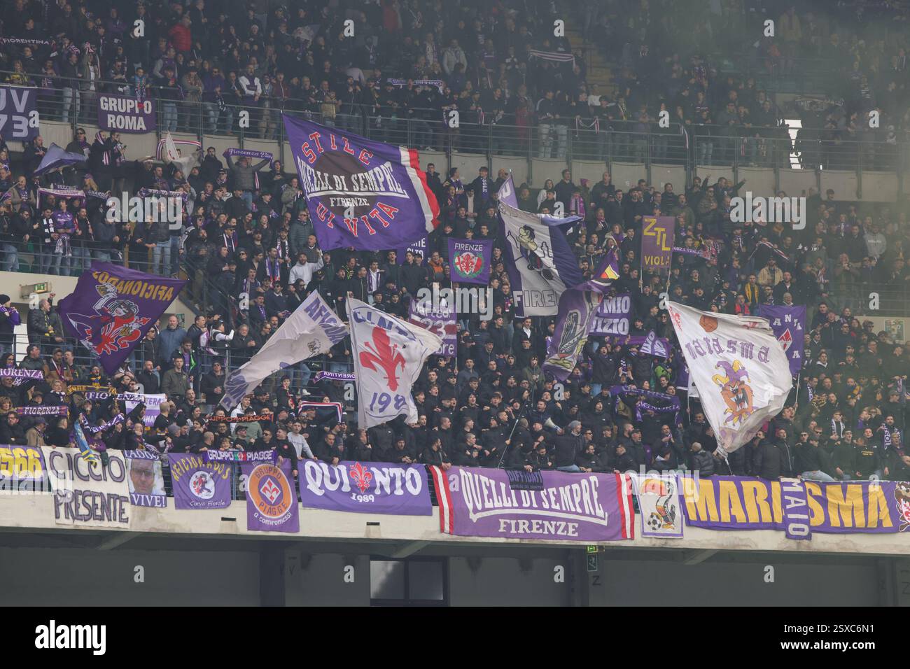 Verona, Italy. 23rd Feb, 2025. ACF Fiorentina fans cheer during the ...
